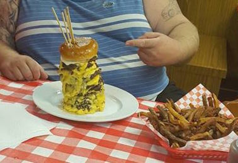 Tall stacks: Bard’s Burgers and Chili stacks the beef patties high and ...