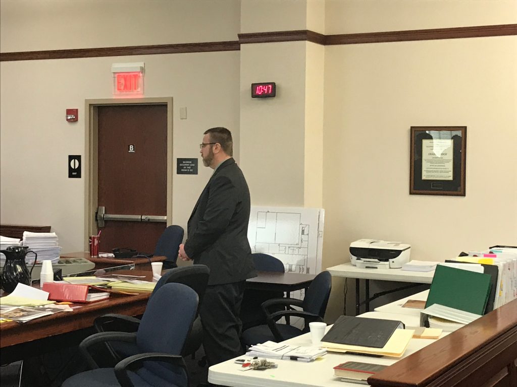 Medical examiner testifies at Dooley retrial that he believes tape gun ...