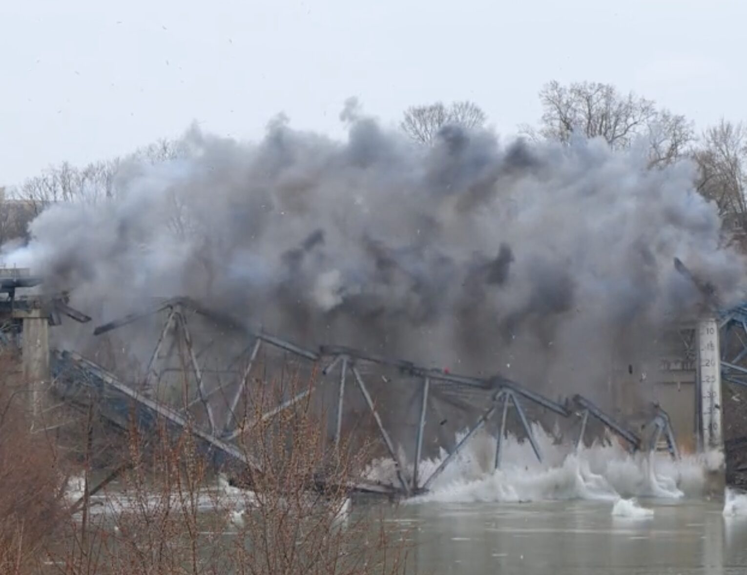 Pop! And old bridge, demolished by 'controlled blast' is gone, making ...